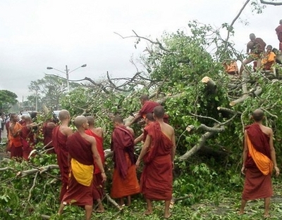 Monks Aid Survivors; Authorities Sell Roofing Material